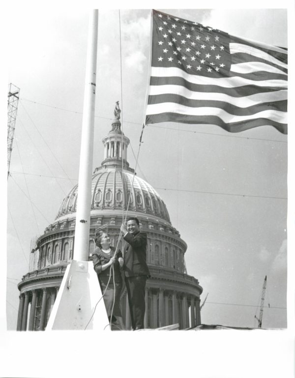 Photo 1143 Senator with Flag on US Capitol | Daniel K. Inouye Institute